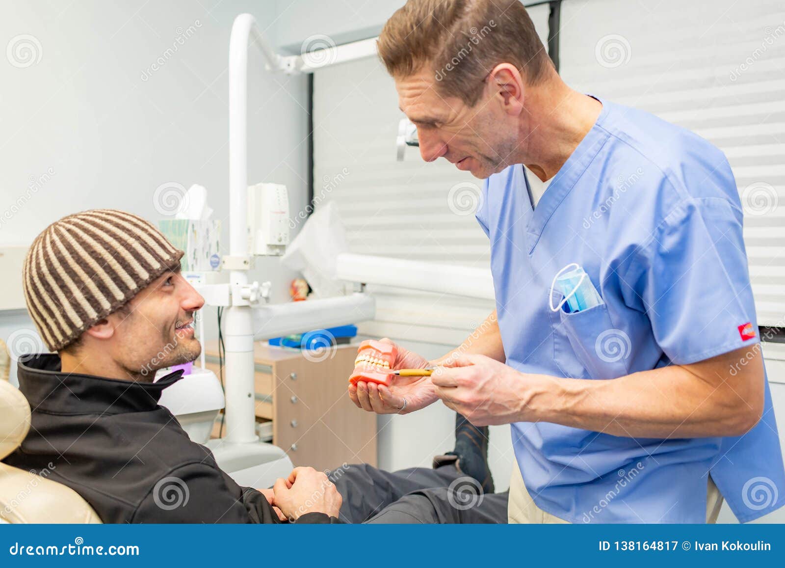 Dentist Explains To Patient on Teeth Mockup Stock Image - Image of oral ...