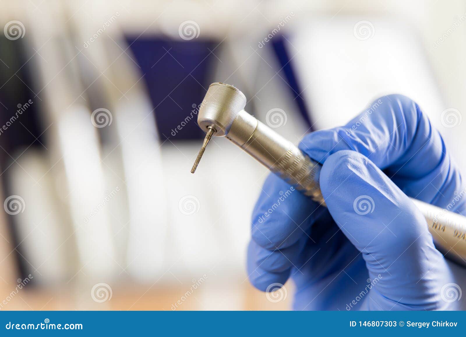 Dentist Hand with Drill Illustrates the Operation of the Dentist Dental ...