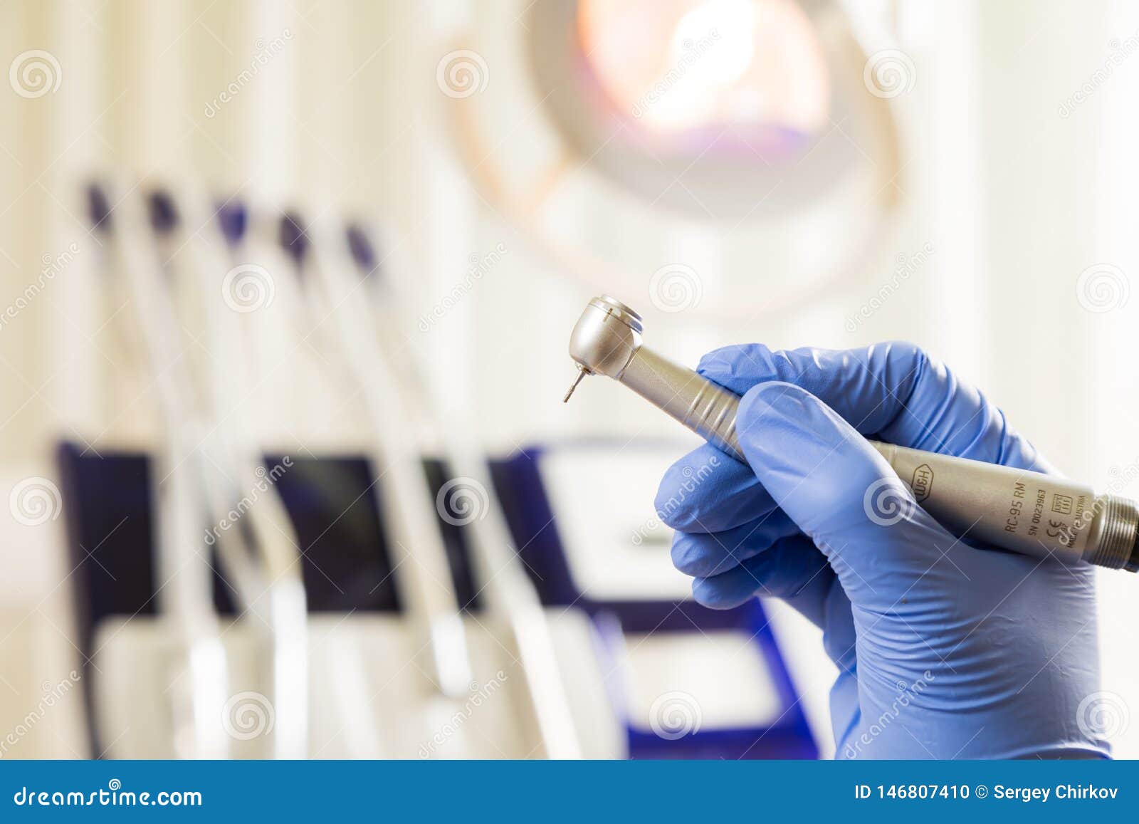 Dentist Hand with Drill Illustrates the Operation of the Dentist Dental ...