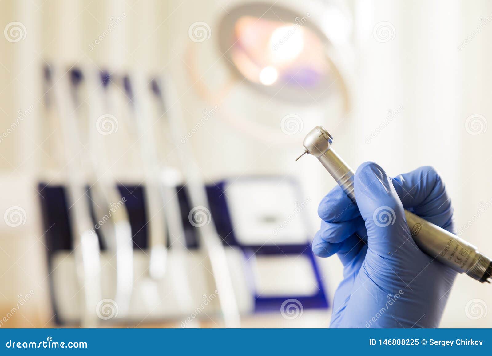 Dentist Hand with Drill Illustrates the Operation of the Dentist Dental ...