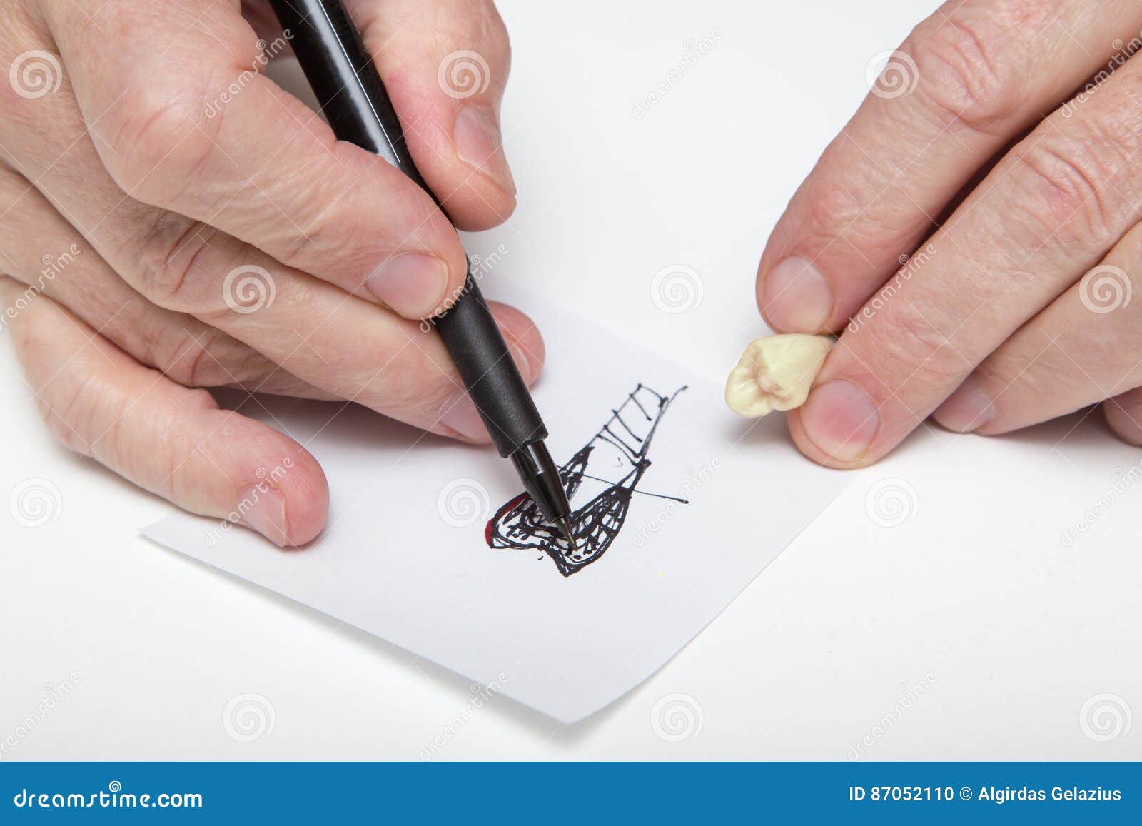 Dentist Hands Drawing Teeth on a White Paper with Black Marker Stock ...