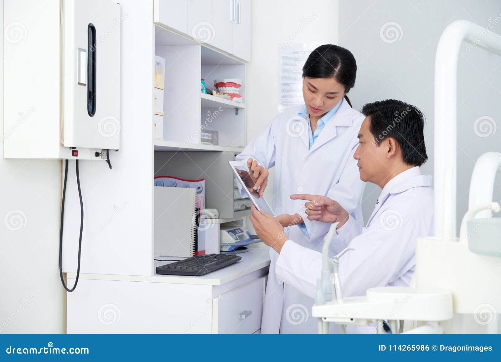 Dentists with Tablet Computer Stock Photo - Image of asian, computer ...