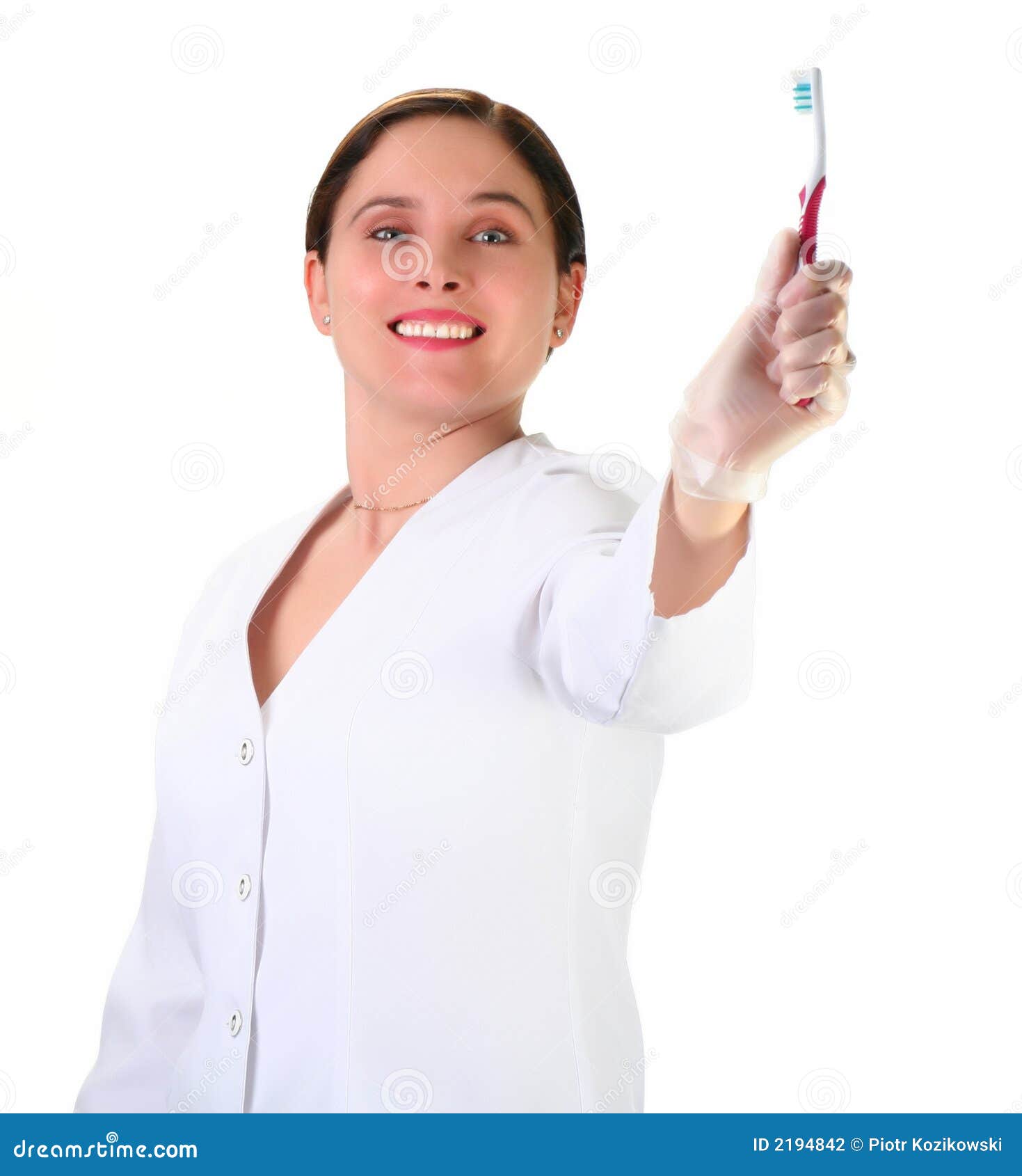 Dentist holding toothbrush stock photo. Image of conceptual - 2194842