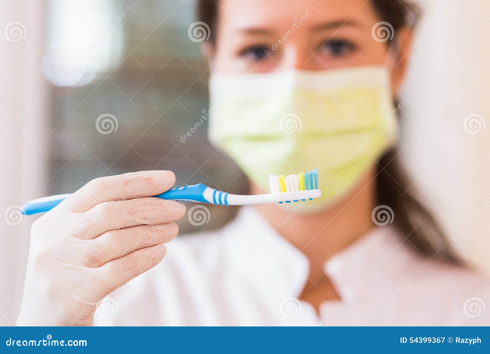Dentist Holding a Toothbrush Stock Image - Image of toothbrush, teeth ...