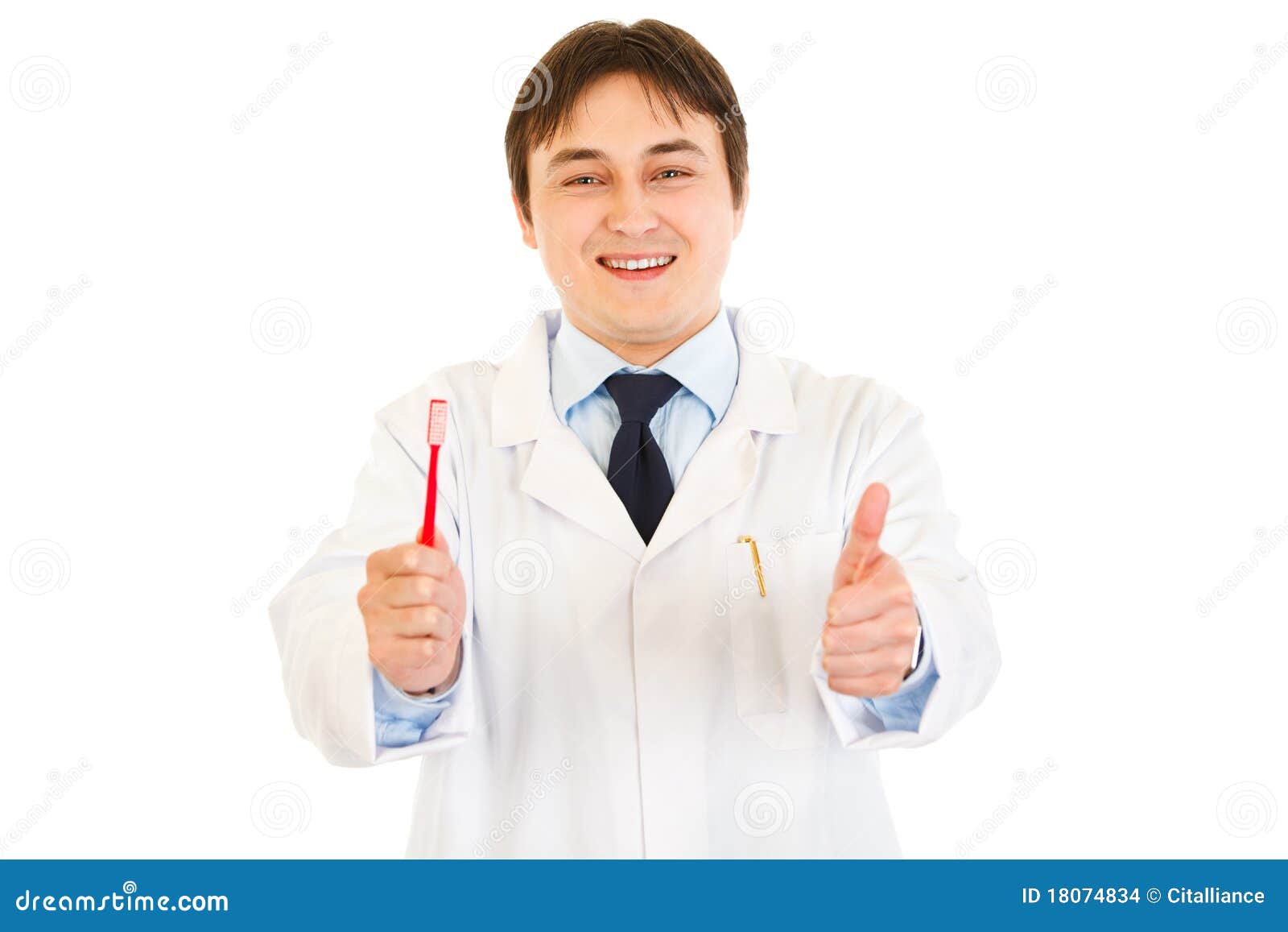 Dentist Holding Toothbrush and Showing Thumbs Up Stock Photo - Image of ...