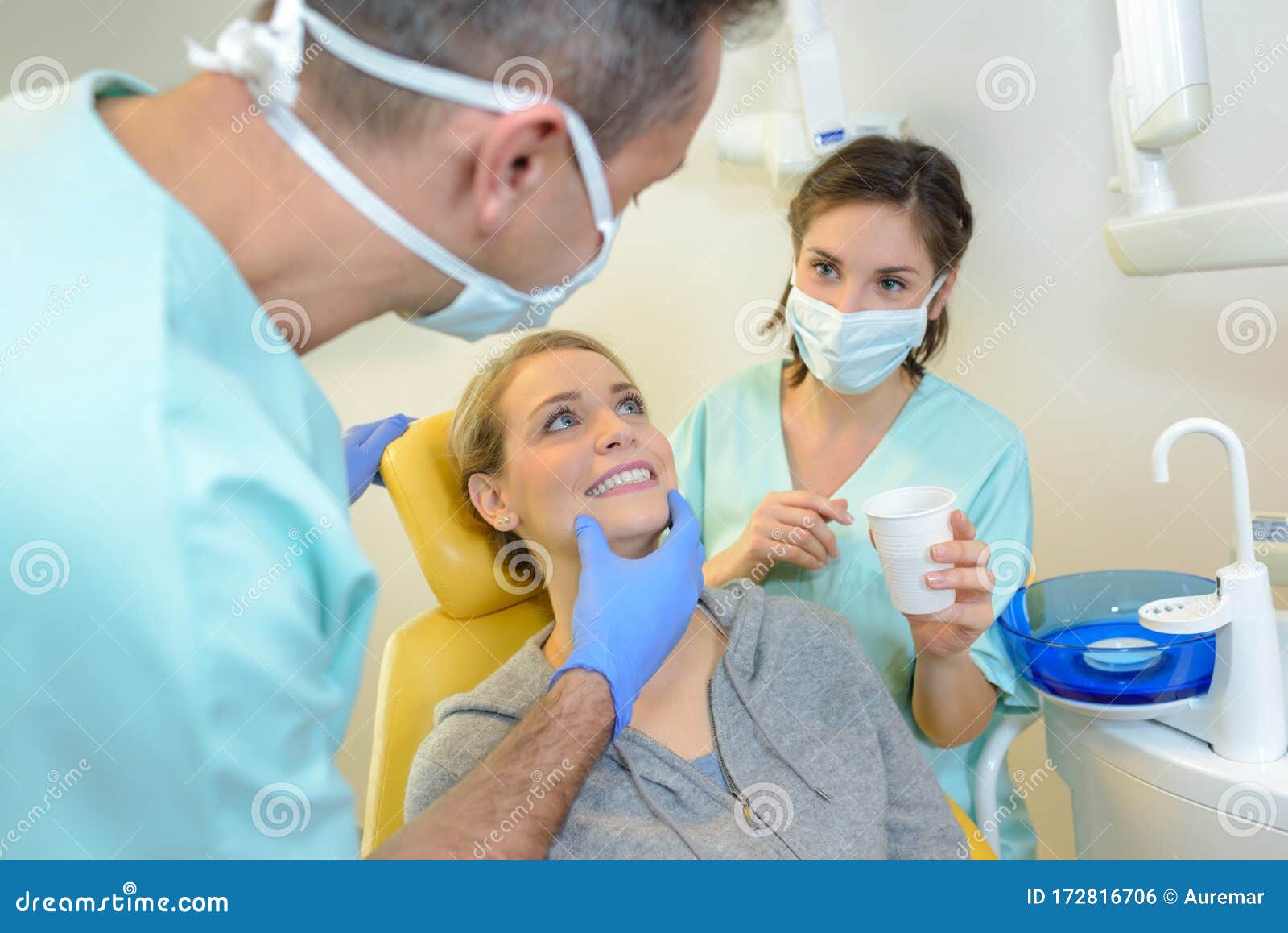 Dentist inspecting teeth stock photo. Image of mouth - 172816706