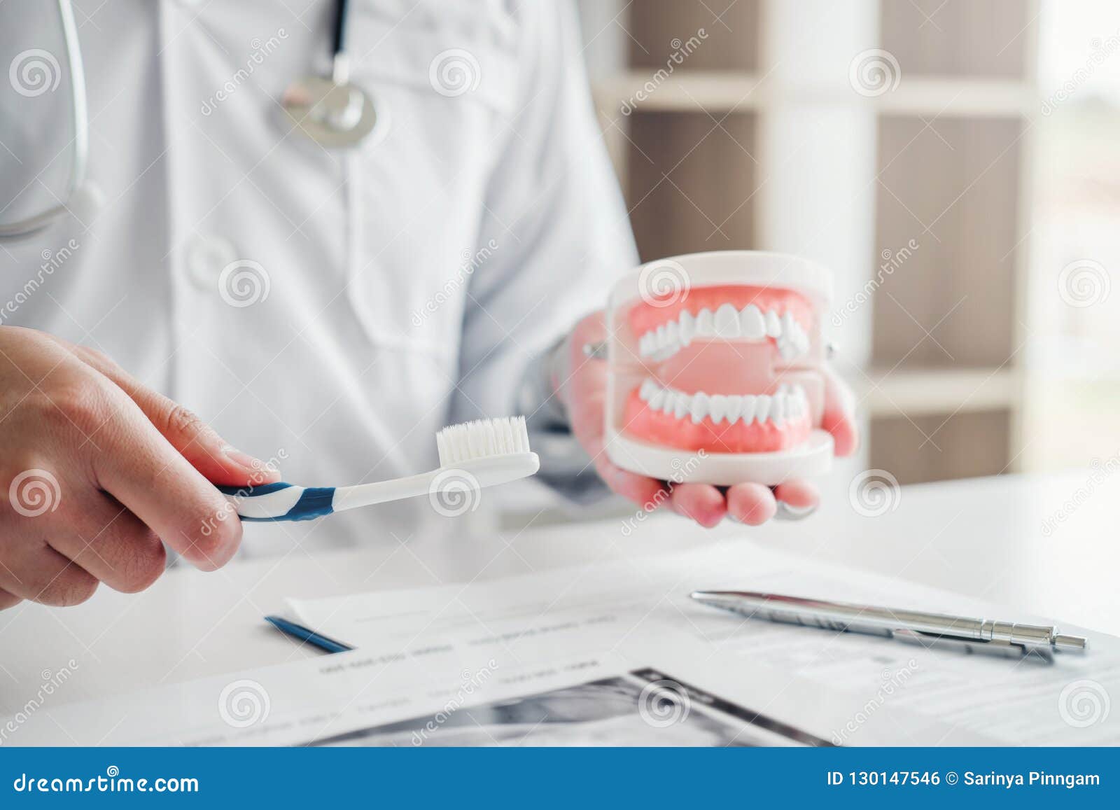 Dentist Learning How To Brush Teeth Stock Photo - Image of exam, doctor ...