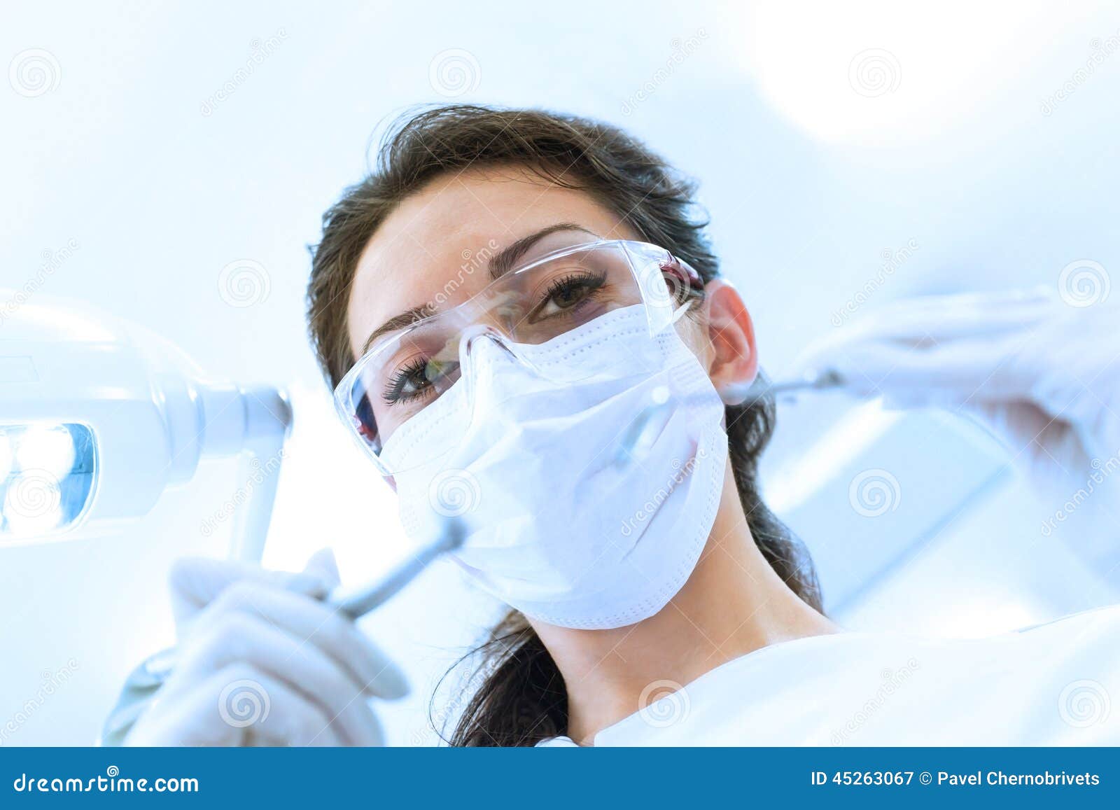 Dentist in Mask Holding Angled Mirror and Drill Stock Image - Image of ...