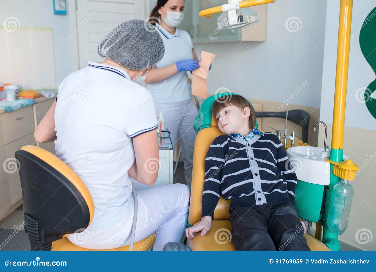 Dentist and Nurse Curing Childe Teeth Stock Image - Image of clinic ...