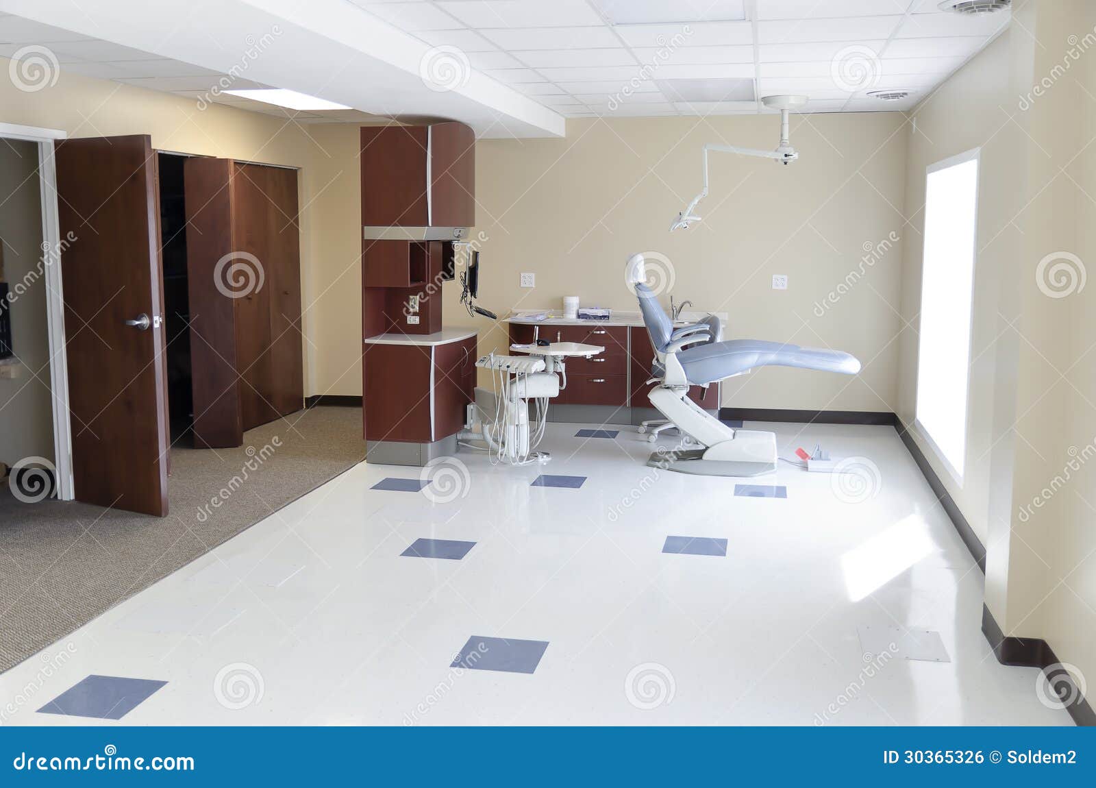 Dentist Office. A Doctor Inside Of A Dentist Cabinet Full Of Medical ...