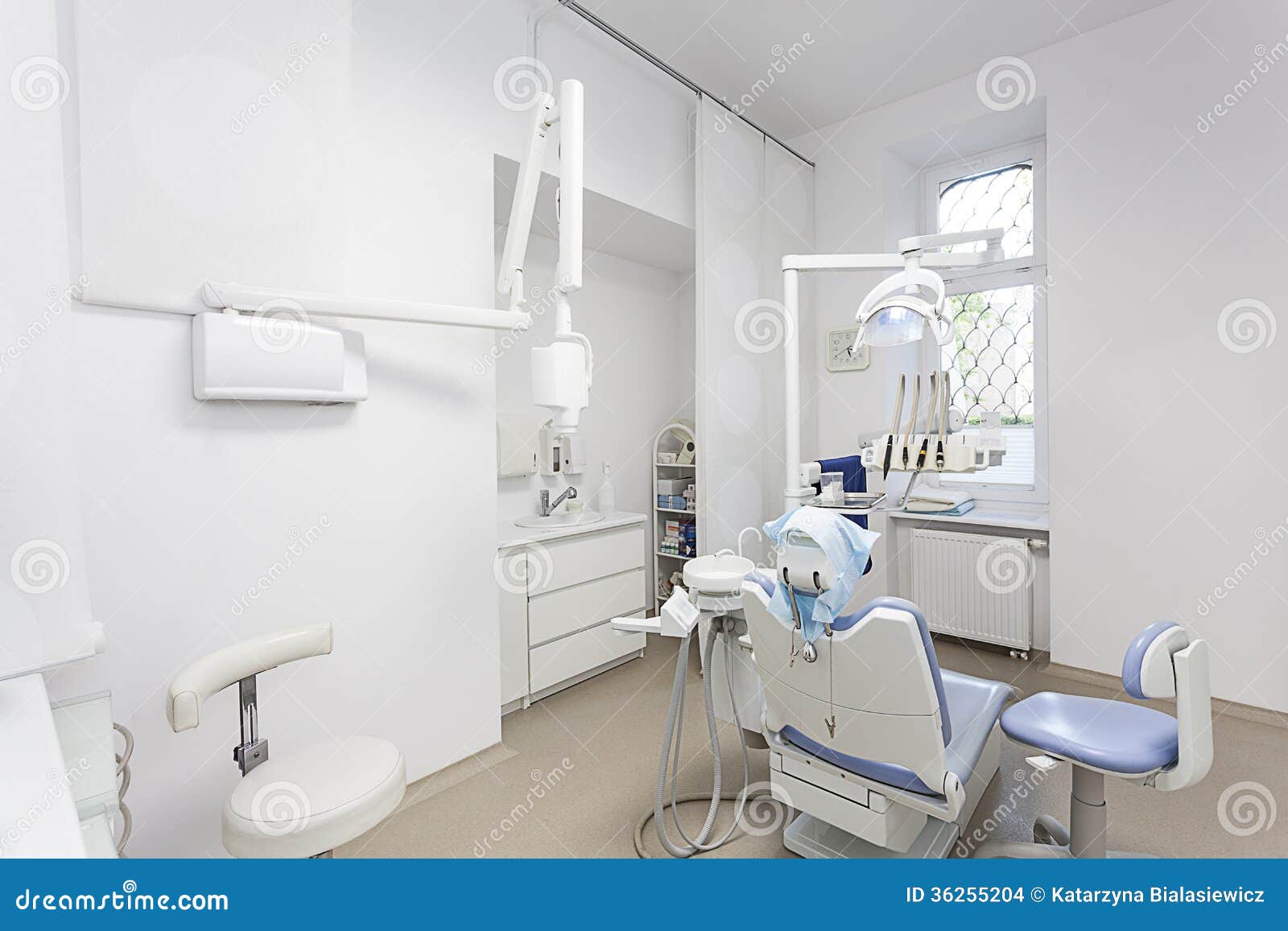 Dentist Office. A Doctor Inside Of A Dentist Cabinet Full Of Medical ...