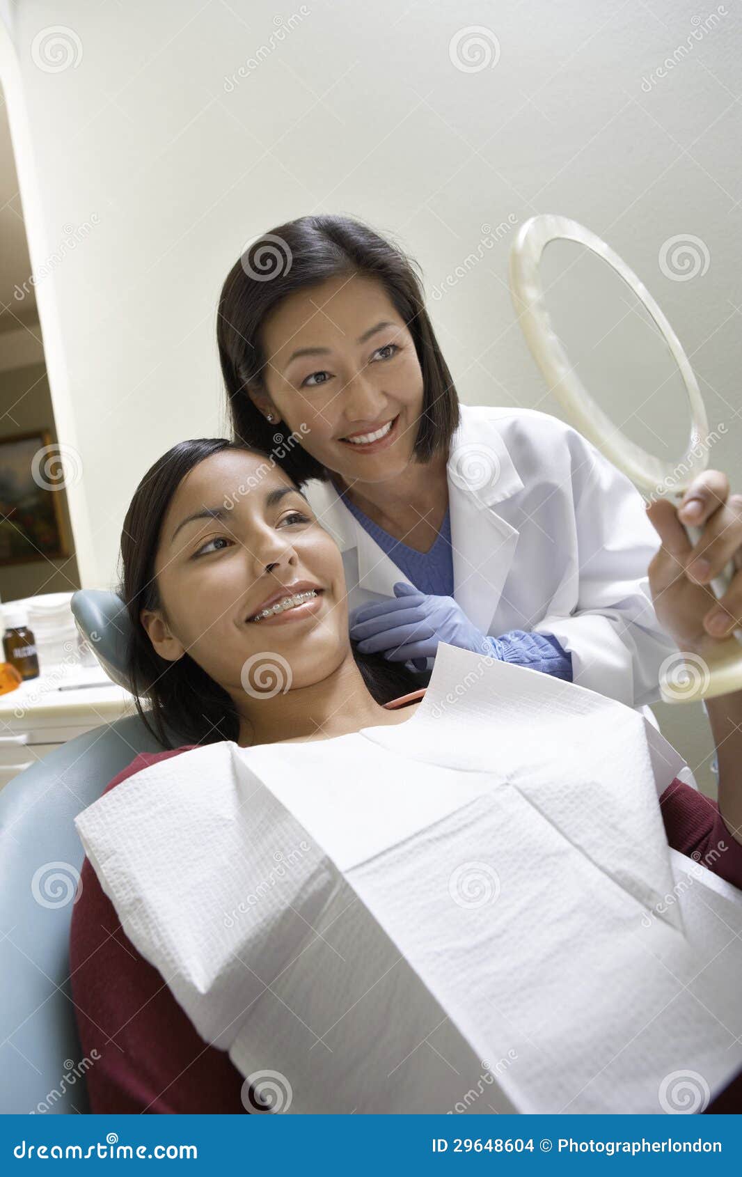 Dentist and Patient Looking in Mirror Stock Photo - Image of checking ...