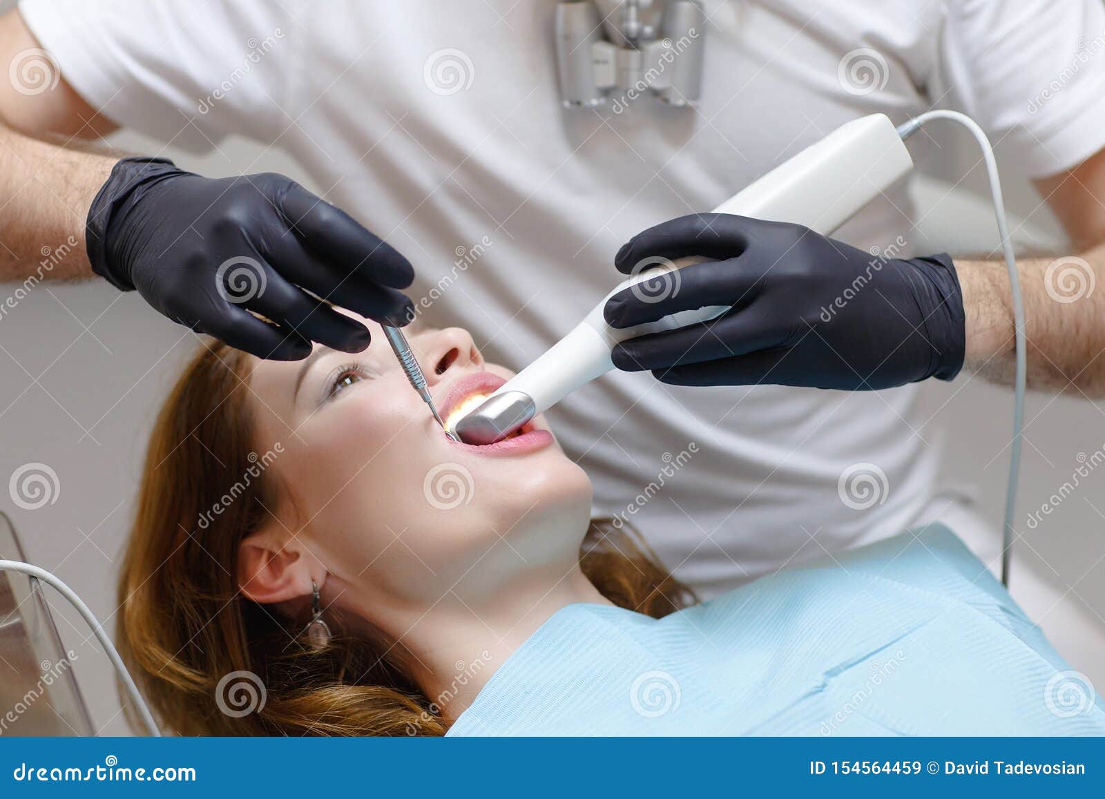 The Dentist Scans the Patient`s Teeth with a 3d Scanner Stock Image ...