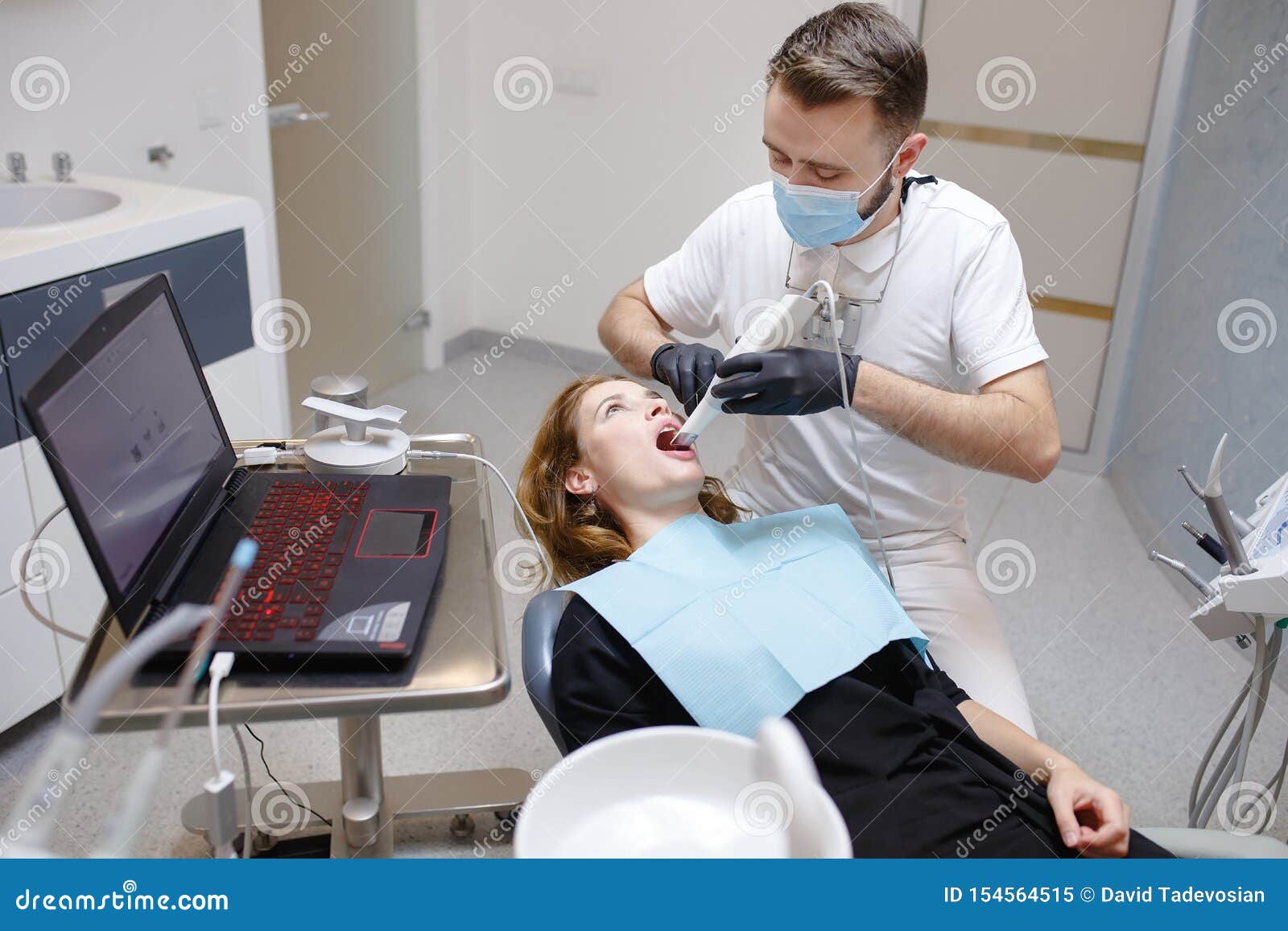 The Dentist Scans the Patient`s Teeth with a 3d Scanner. Stock Image ...