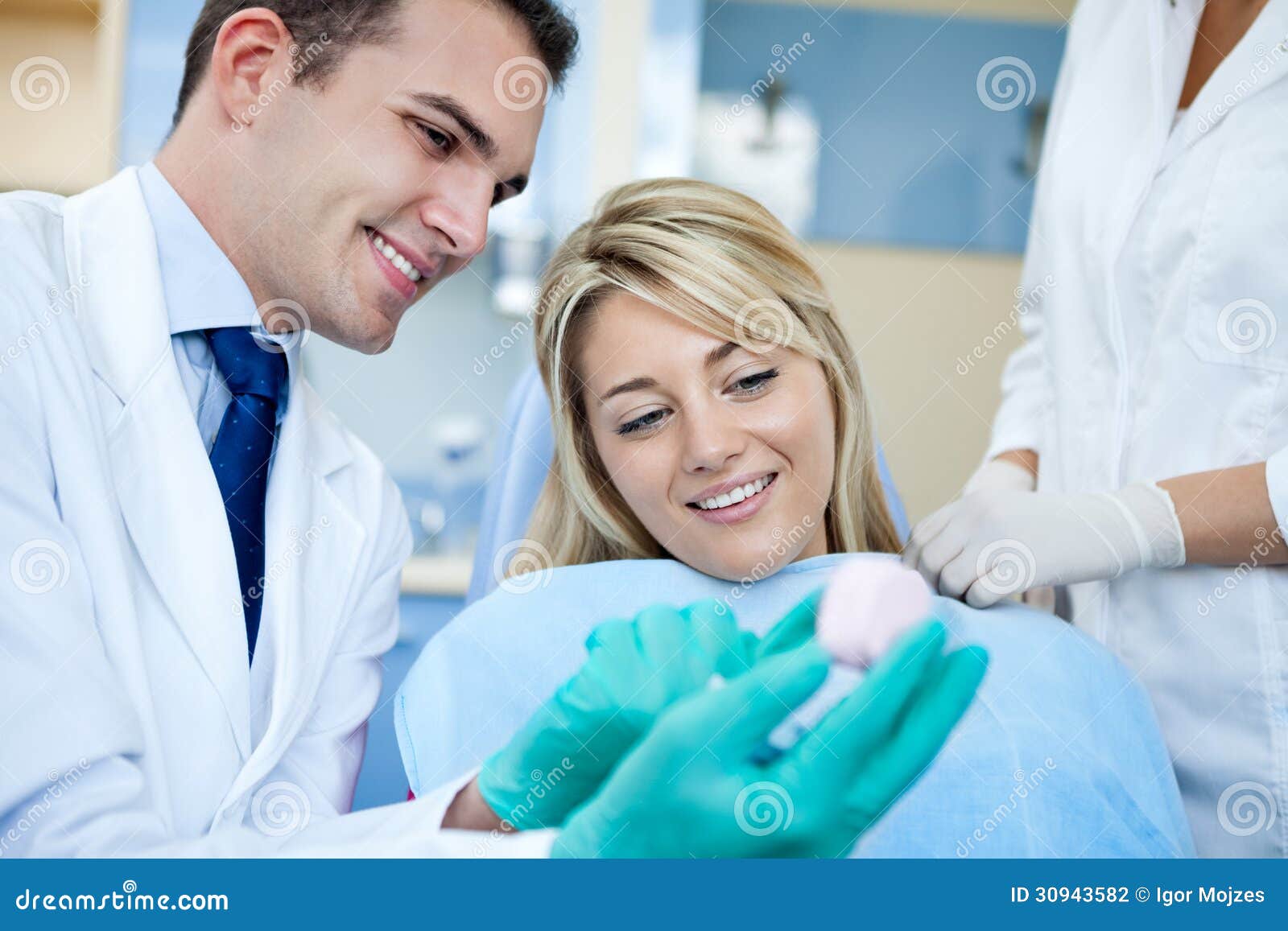 Dentist Showing Teeth Sample Stock Photo - Image of help, clinical ...