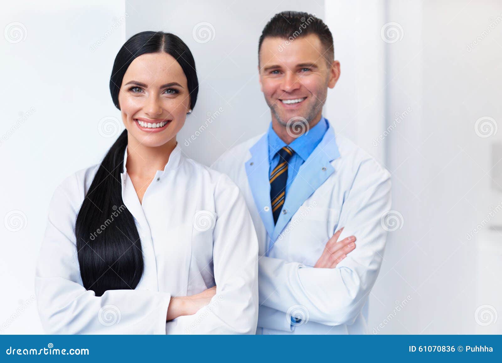 Dentist Team at Dental Clinic. Two Smiling Doctors at Their Work Stock ...