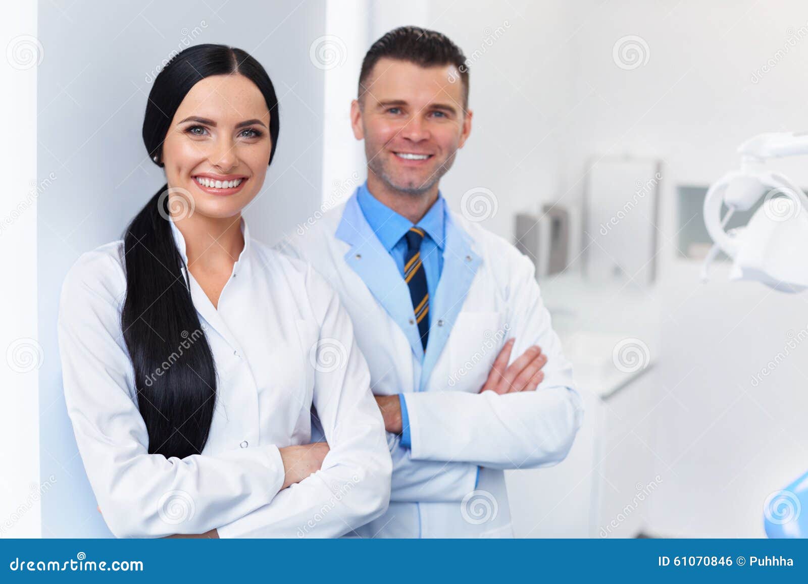 Dentist Team at Dental Clinic. Two Smiling Doctors at Their Work Stock ...