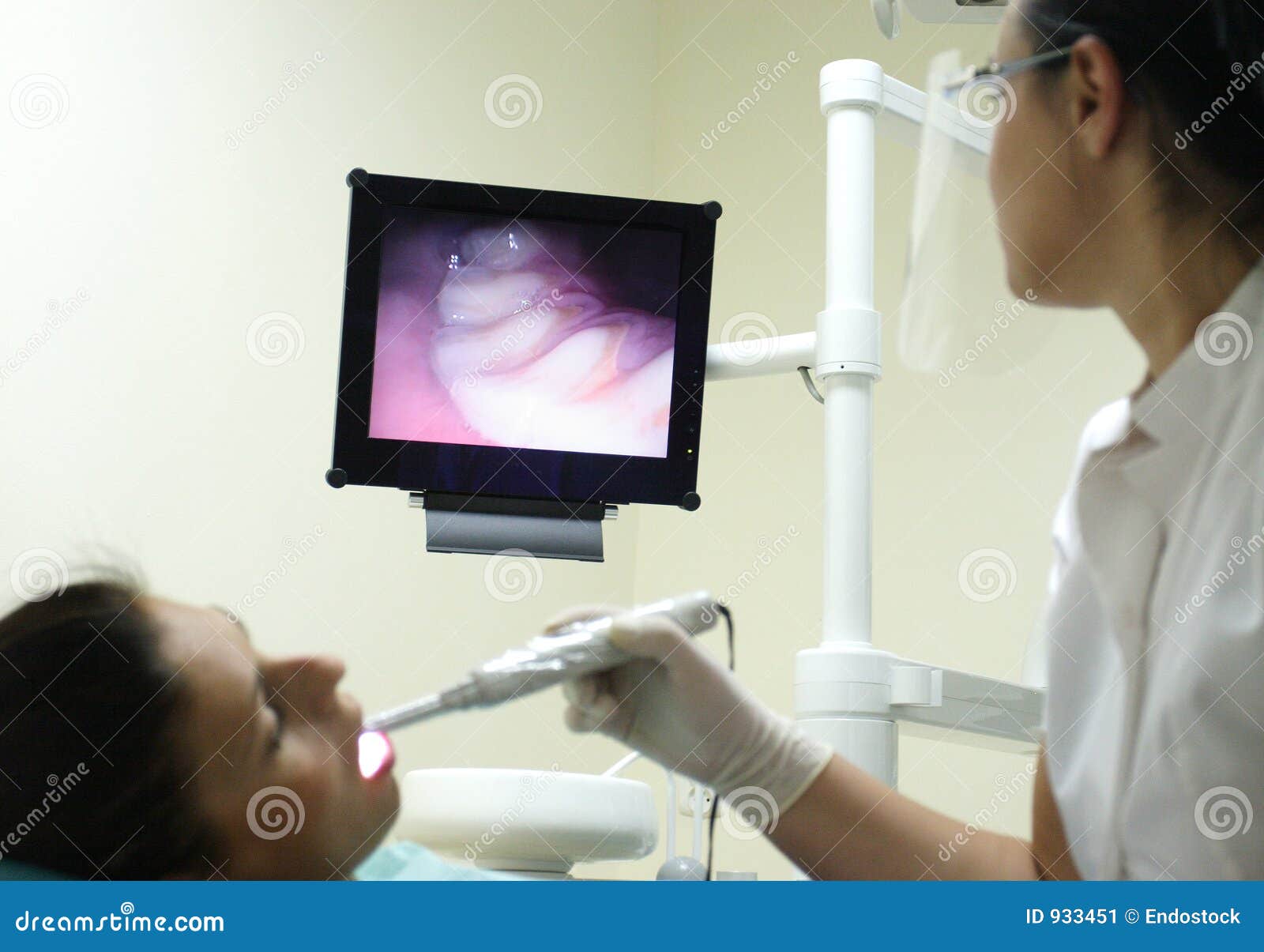At the Dentist - Teeth at the Screen Stock Image - Image of coveralls ...
