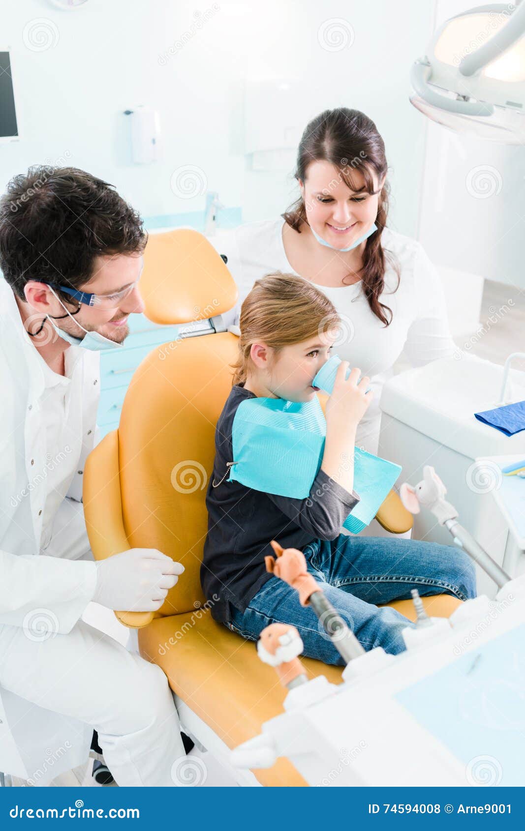 Dentist Treating Child in His Surgery Stock Photo - Image of teeth ...