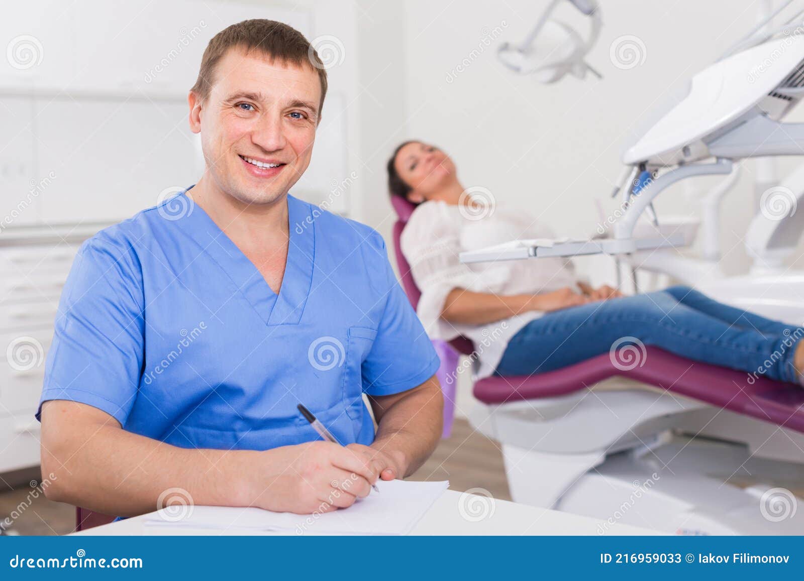 Dentist in Uniform Writing Document Stock Image - Image of practitioner ...