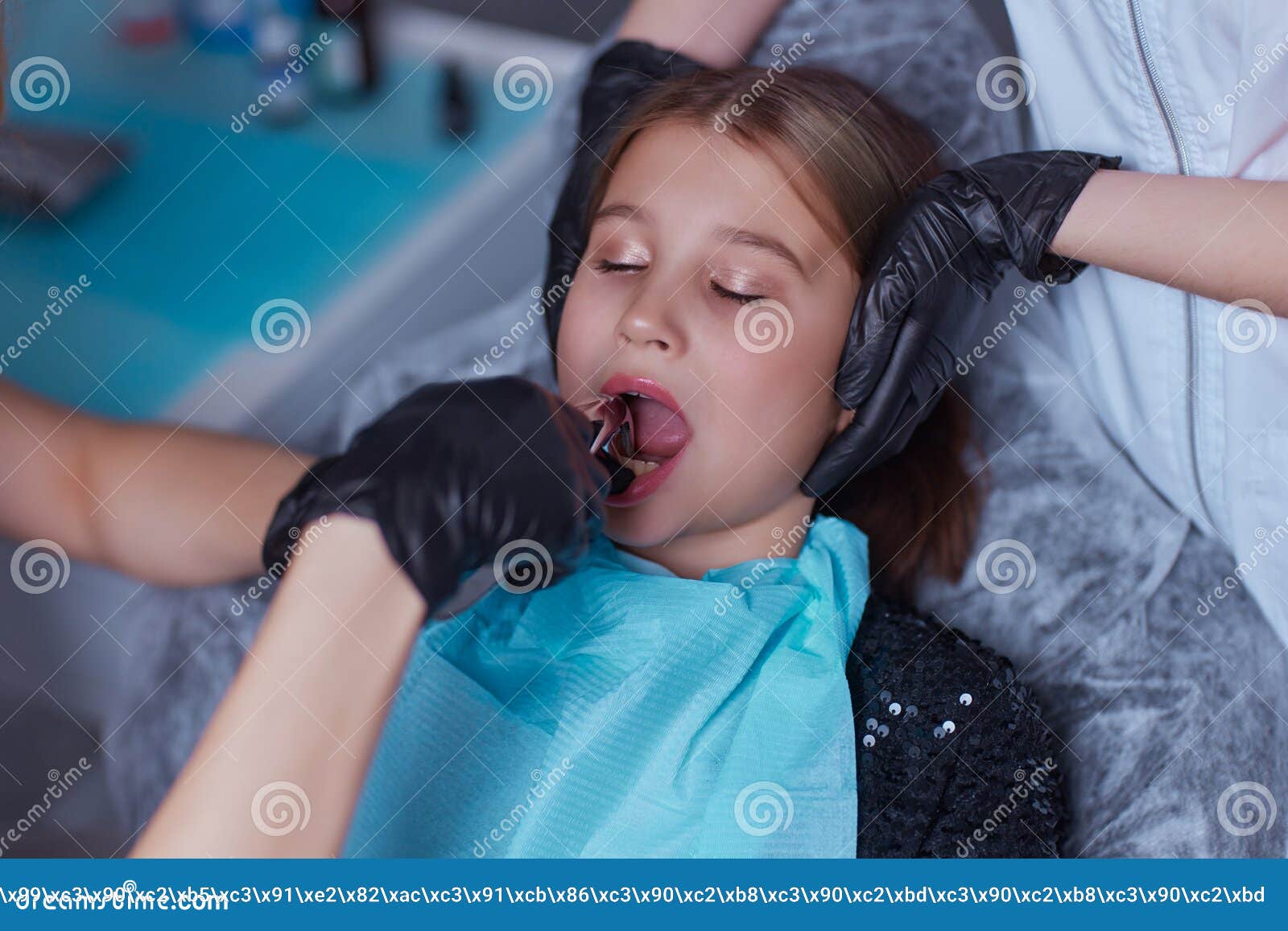 Dentist Use Anesthetic Injection for Tooth Extraction in Child. Stock ...