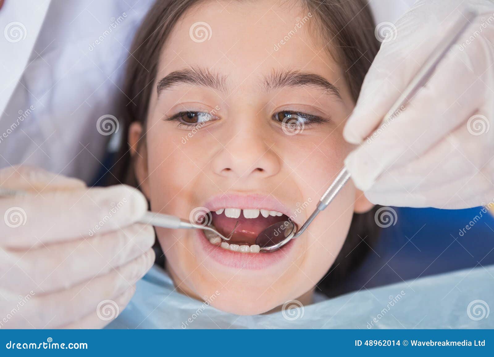 Dentist Using Dental Explorer and Angled Mirror Stock Photo - Image of ...
