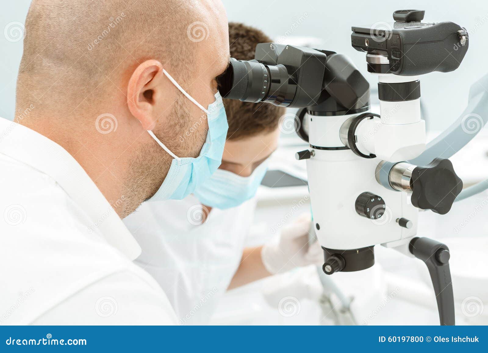 Dentist Using Dental Microscope during Inspection Stock Photo - Image ...