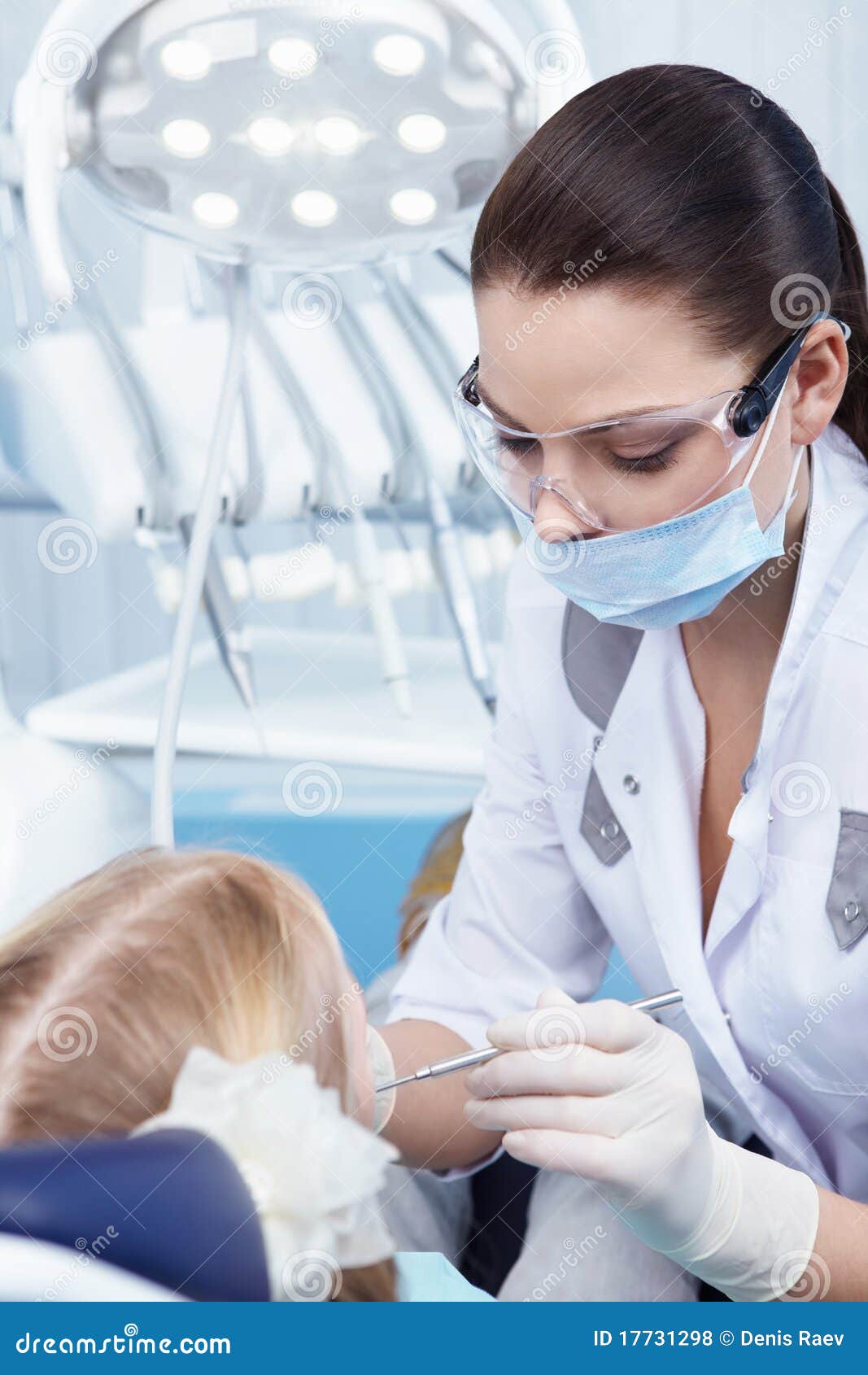 Dentist at work stock photo. Image of office, lamp, female - 17731298
