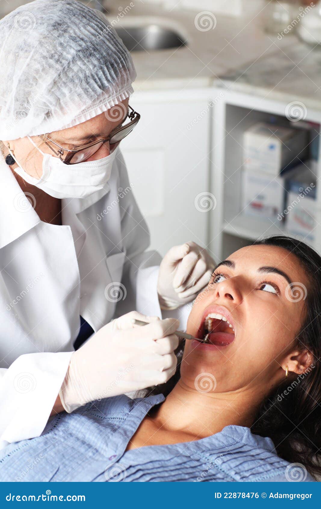 Dentist at work stock photo. Image of clinic, dental - 22878476