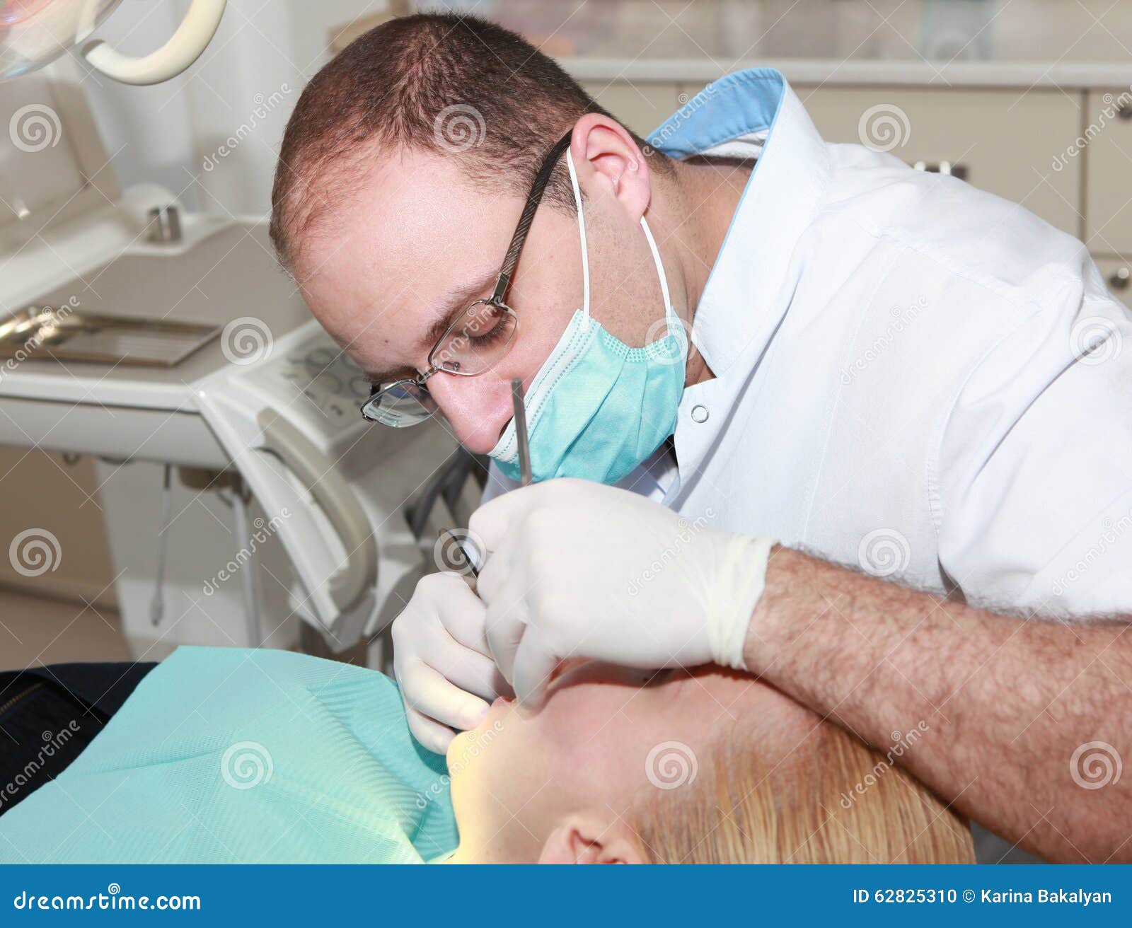 Dentist at Work in Dental Room Stock Photo - Image of machine, medics ...