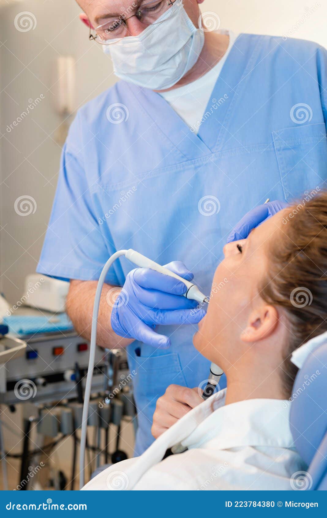 Dentist at work stock photo. Image of caucasian, patient - 223784380