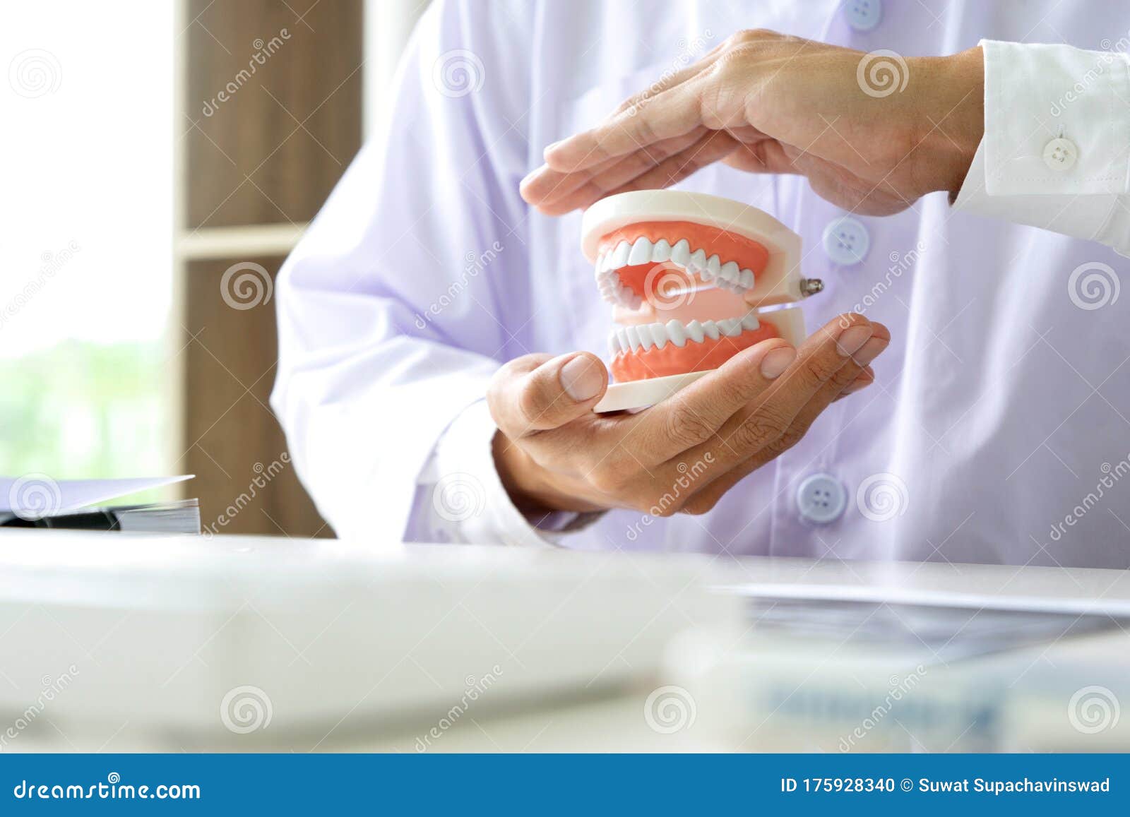 Dentist Work on the Table with Denture and Teeth X-ray Stock Photo ...