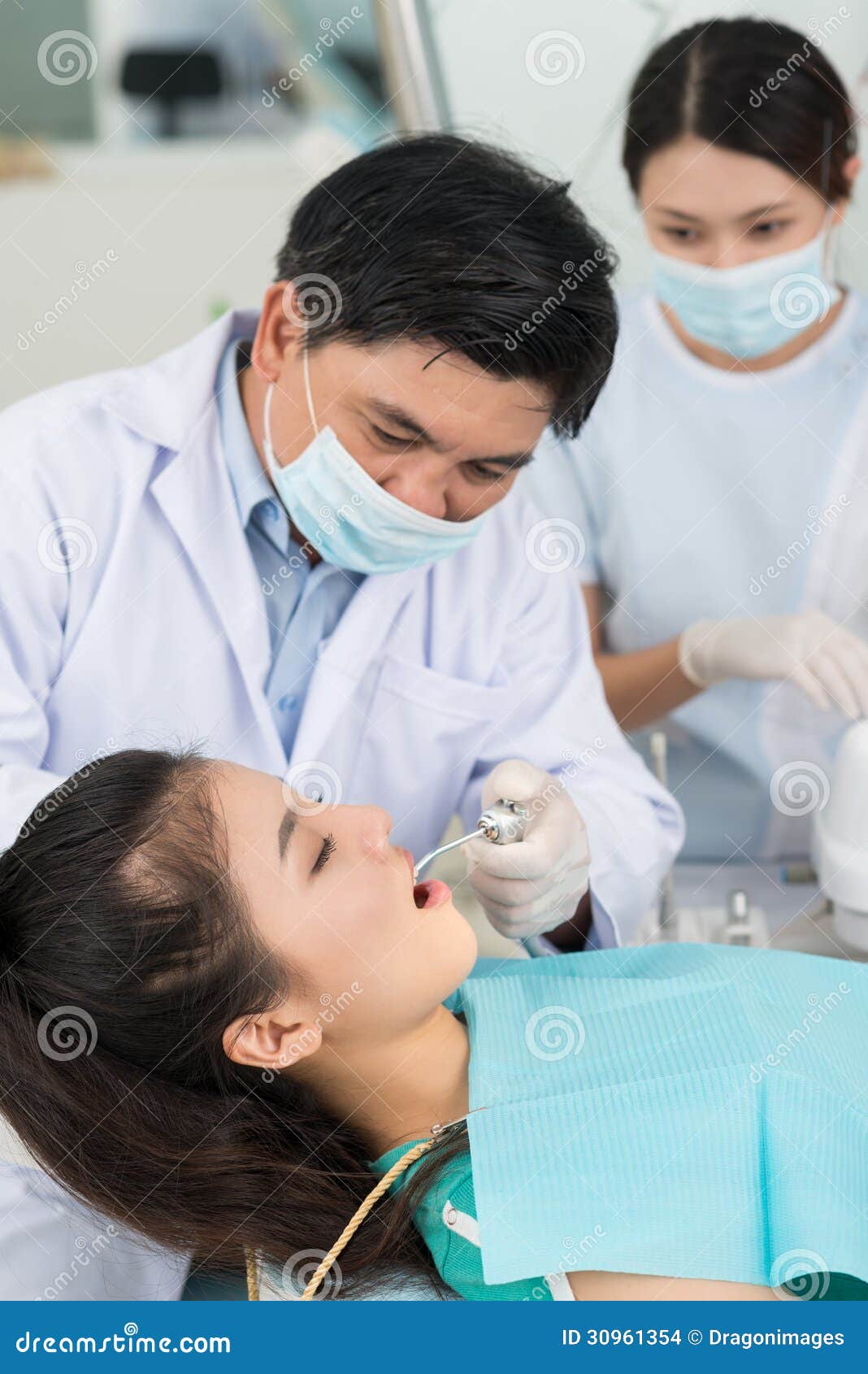 Dentist at work stock photo. Image of filling, indoor - 30961354