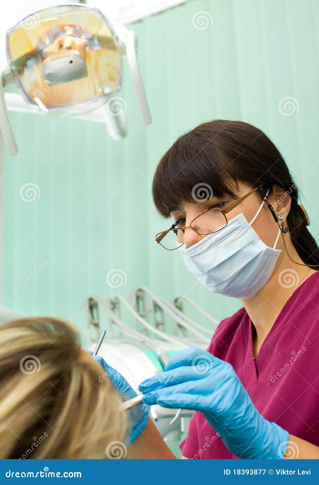 Dentist working stock image. Image of healthcare, instrument - 18393877