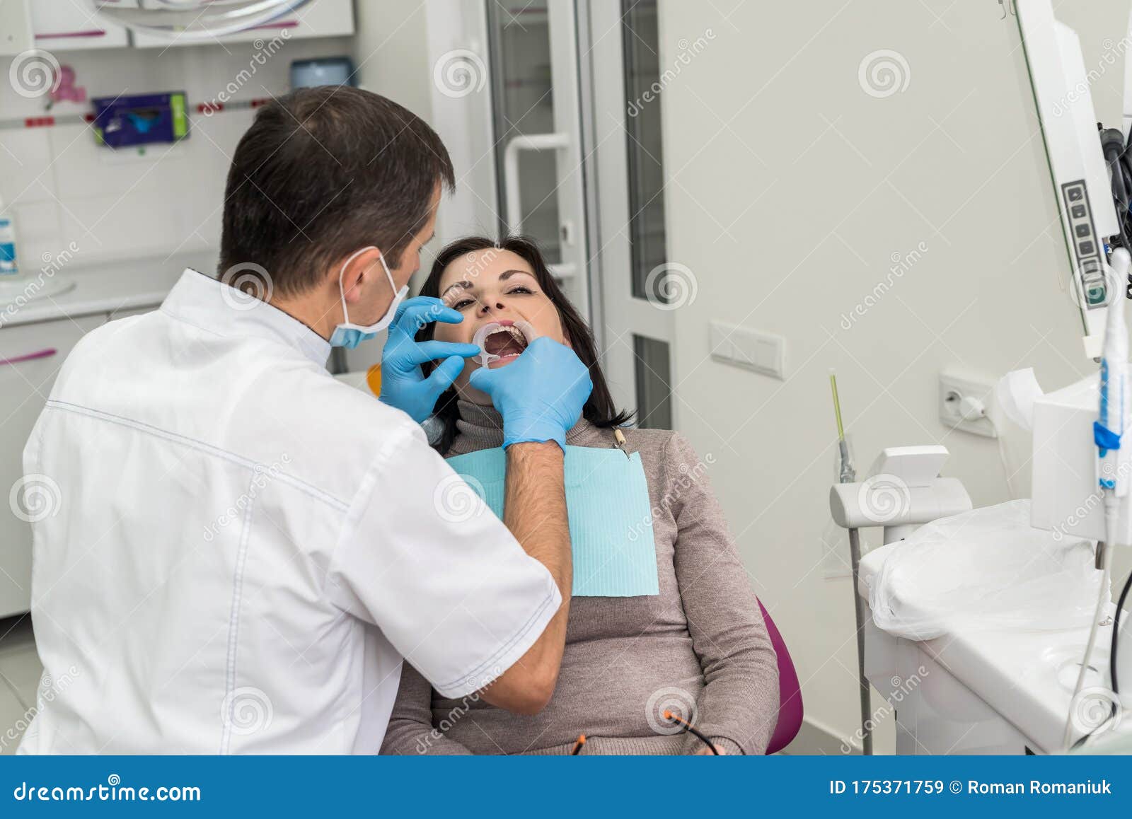 Dentist Working with Patient in Dentist Office Stock Image - Image of ...