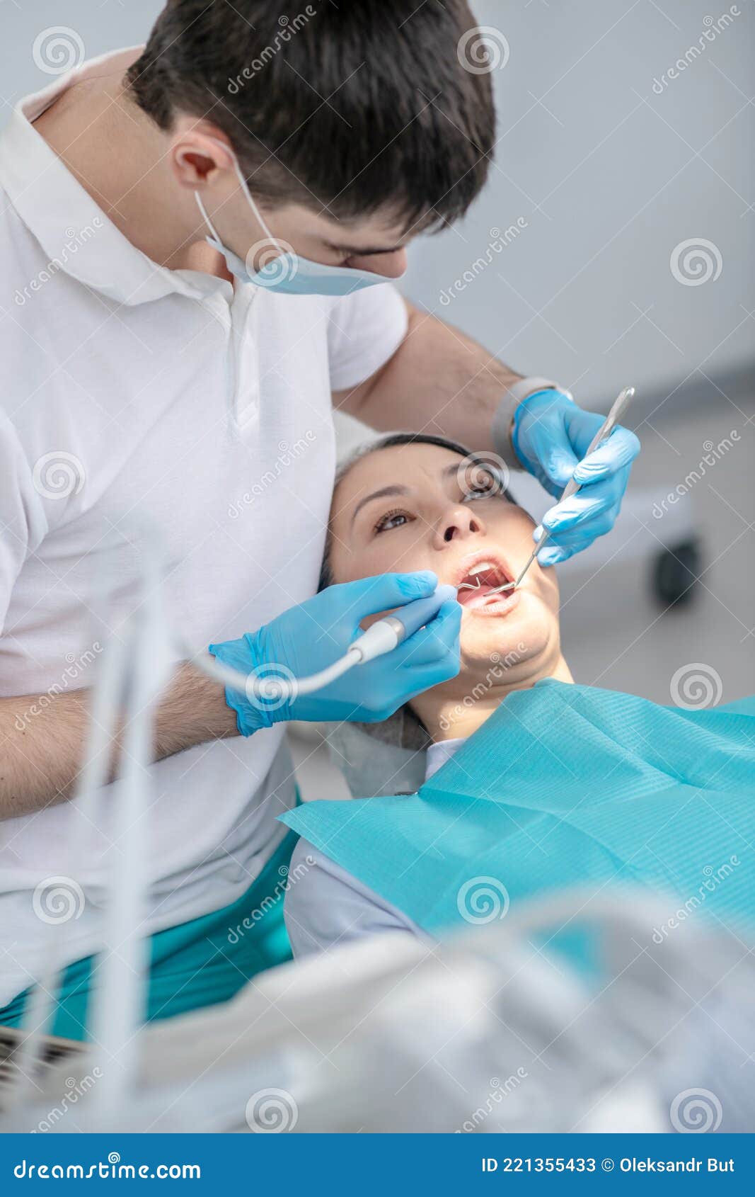 Dentist Working on Patients Teeth Restoration and Making Dental ...