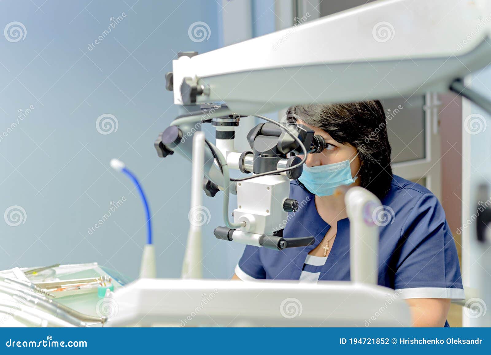 The Dentist Works on a Dental Microscope in a Dental Clinic Stock Photo ...