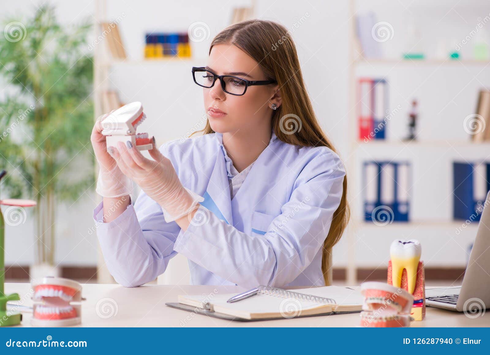 The Dentistry Student Practicing Skills in Classroom Stock Photo ...