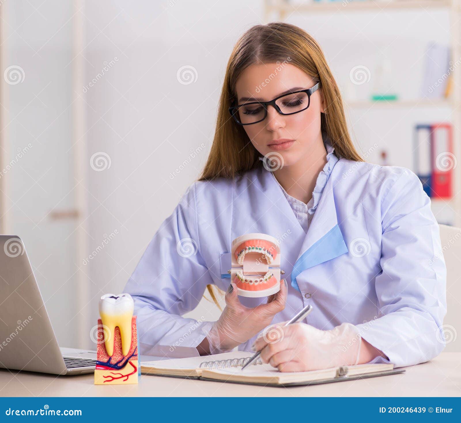 Dentistry Student Practicing Skills in Classroom Stock Image - Image of ...