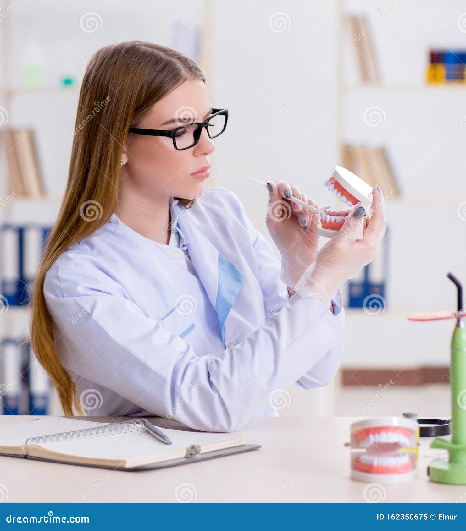 Dentistry Student Practicing Skills in Classroom Stock Image - Image of ...