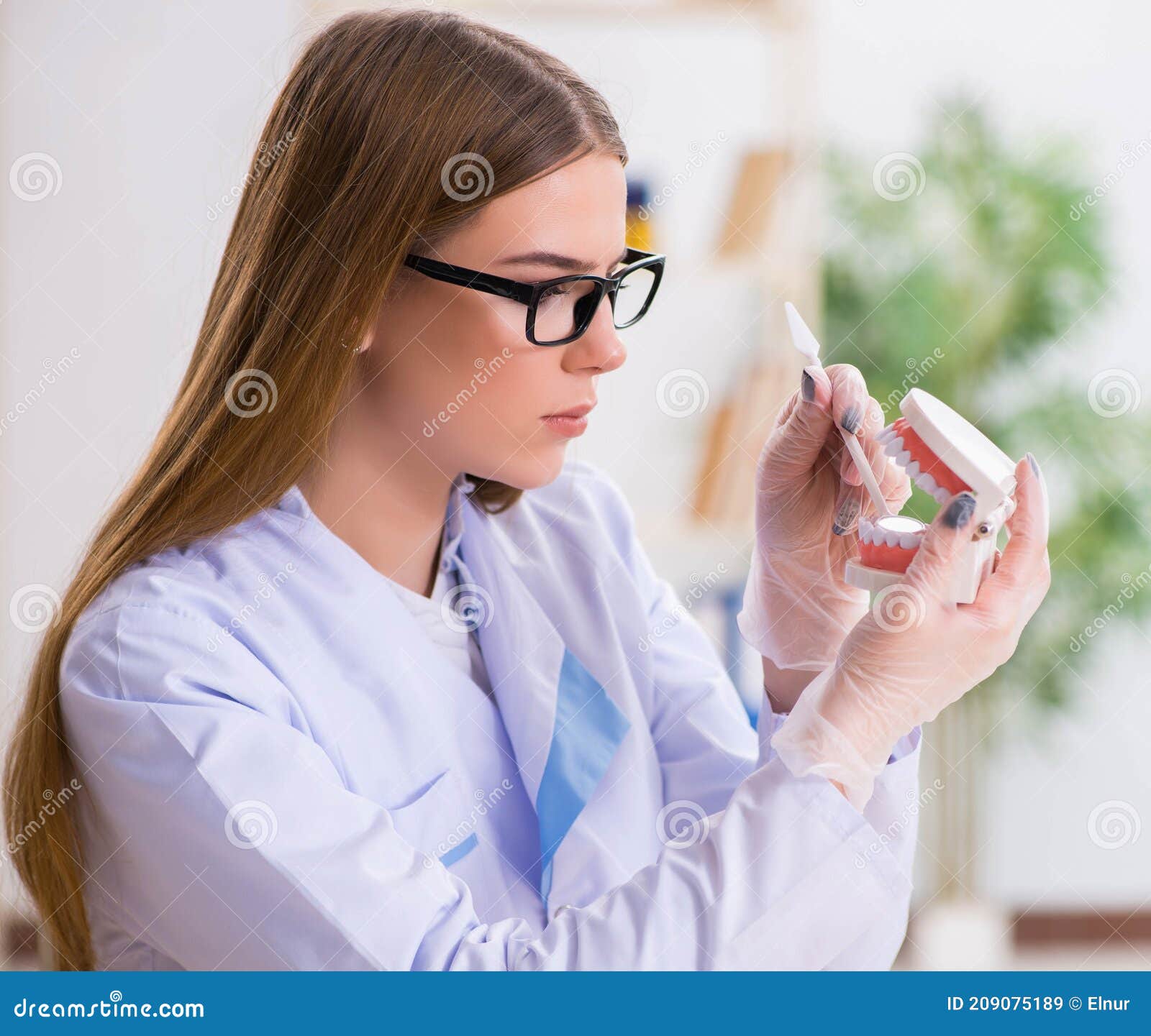 Dentistry Student Practicing Skills in Classroom Stock Image - Image of ...