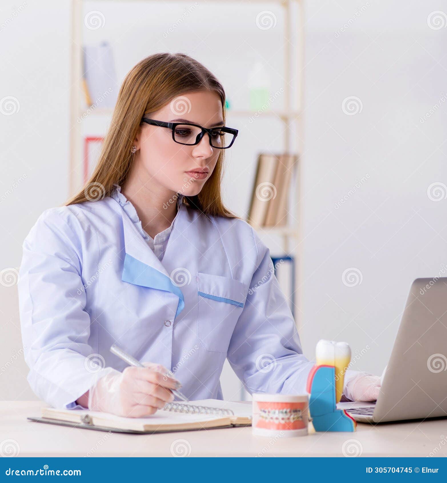 Dentistry Student Practicing Skills in Classroom Stock Image - Image of ...