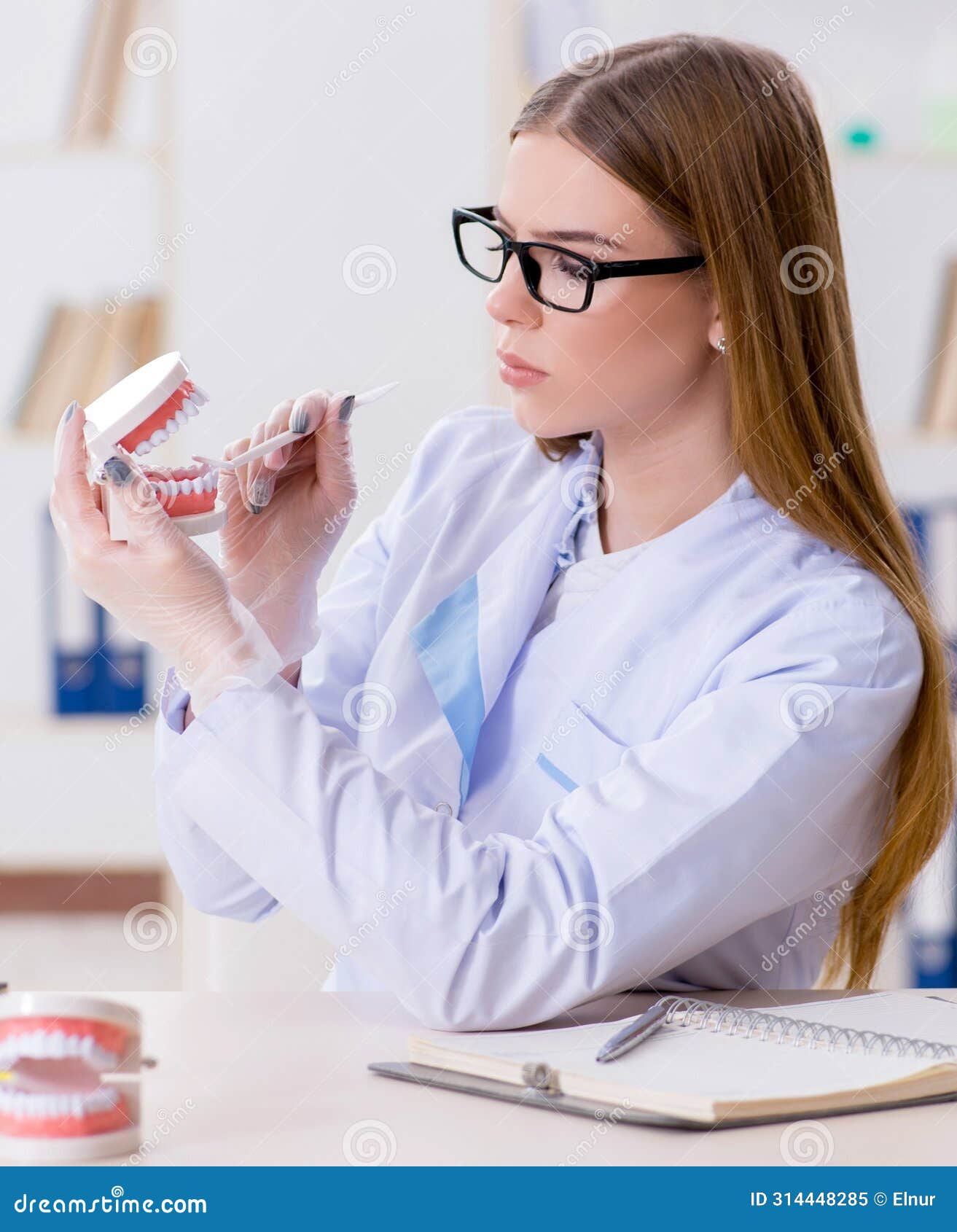 Dentistry Student Practicing Skills in Classroom Stock Image - Image of ...
