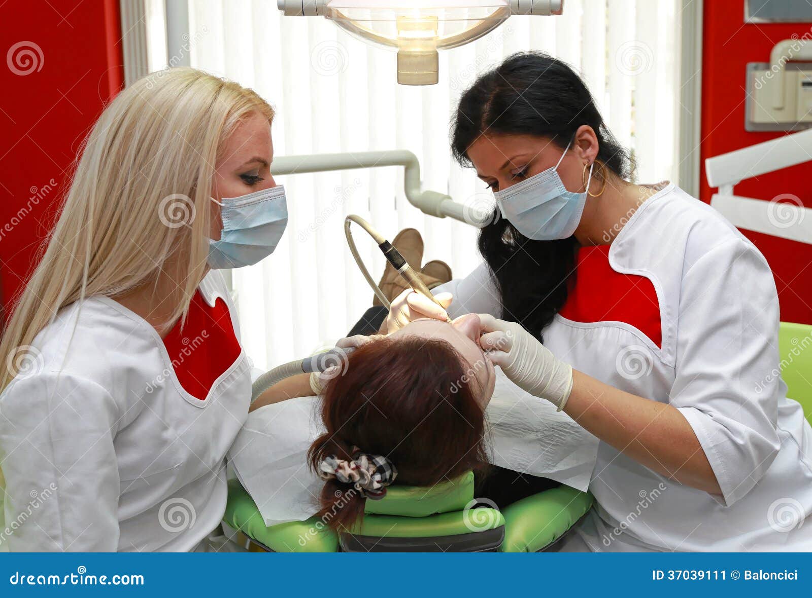 Dentists at work stock image. Image of healthcare, equipment - 37039111
