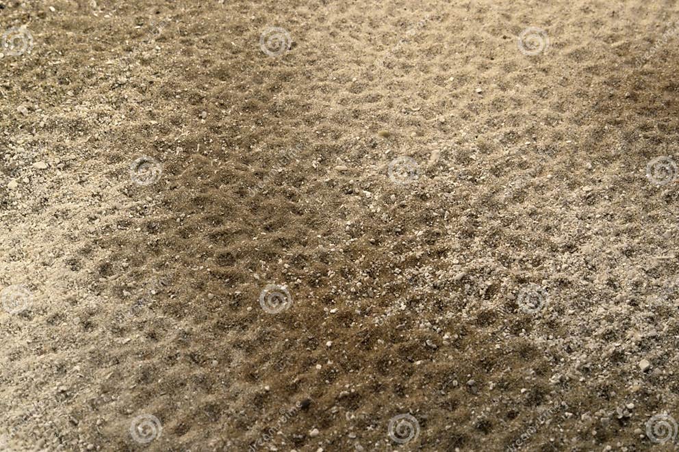 Dents in Multitoned Brown Sand Surface Stock Photo - Image of close ...