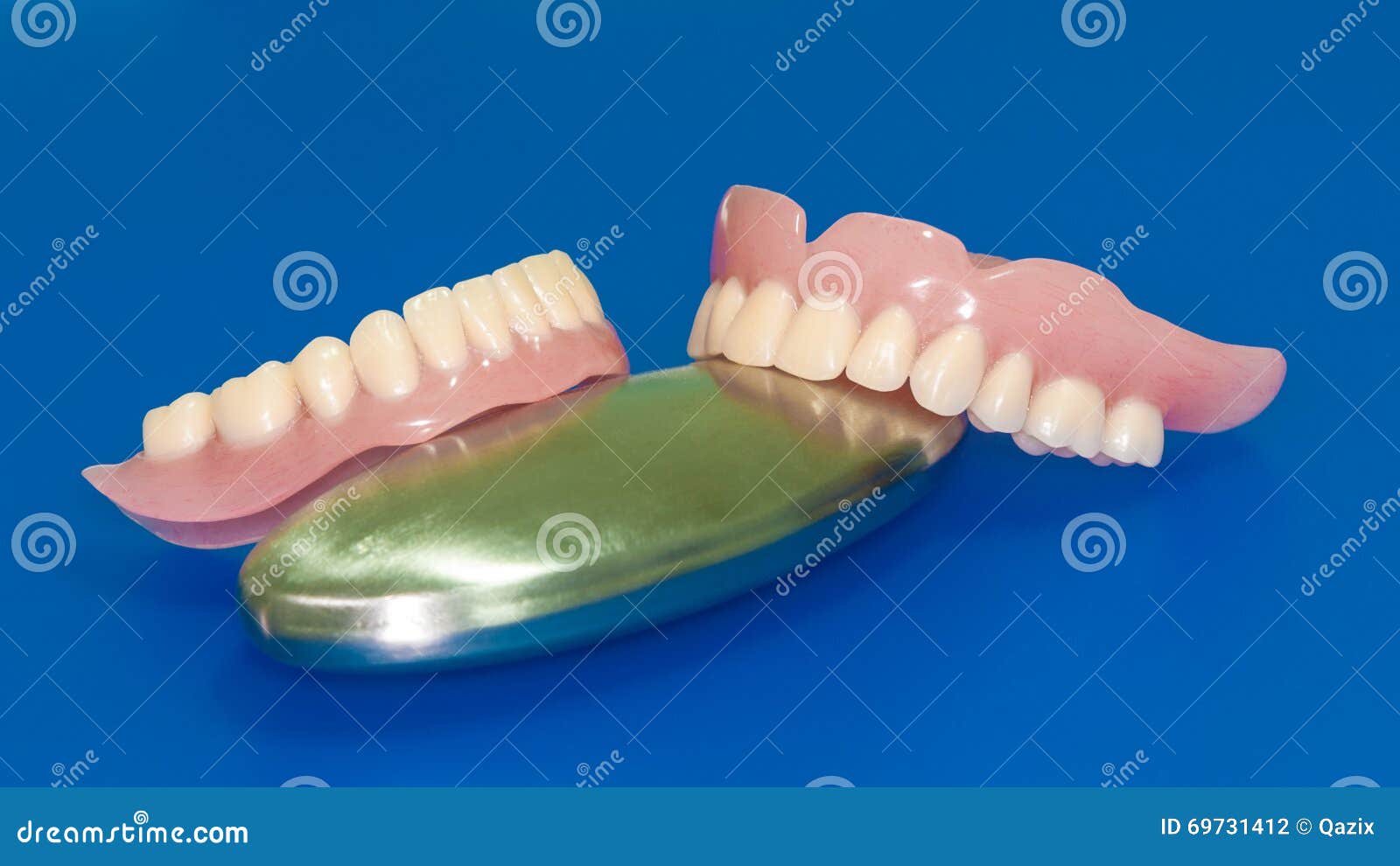 Denture on a Blue Background Stock Photo - Image of equipment ...