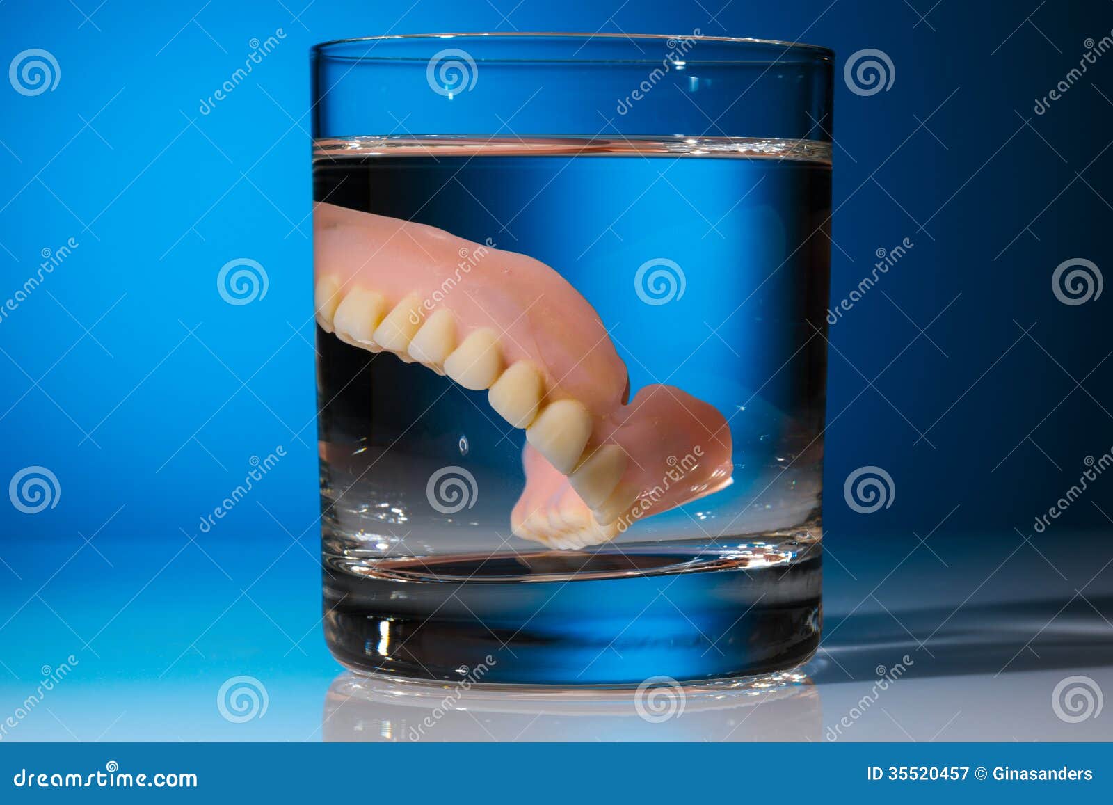 Denture in water glass stock image. Image of care, insurance - 35520457