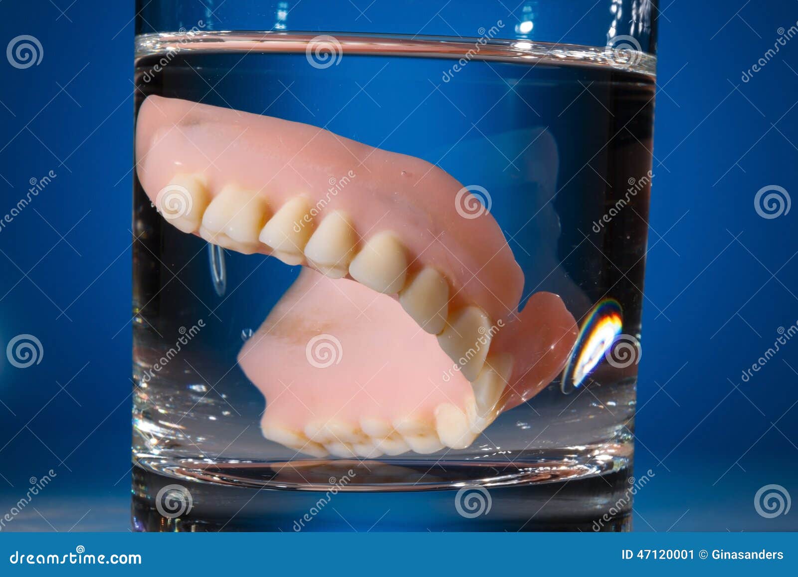 Denture in water glass stock image. Image of precaution - 47120001