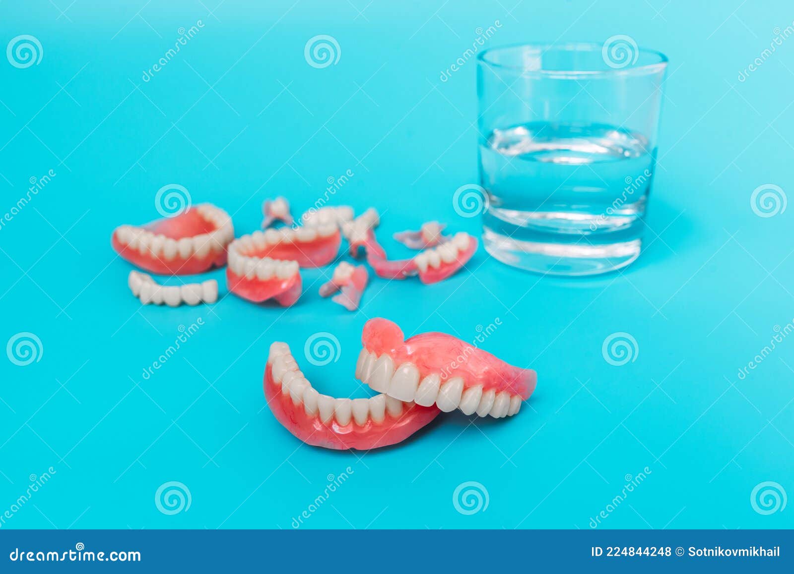 Dentures on a Blue Background. Close-up of Dentures. Full Removable ...