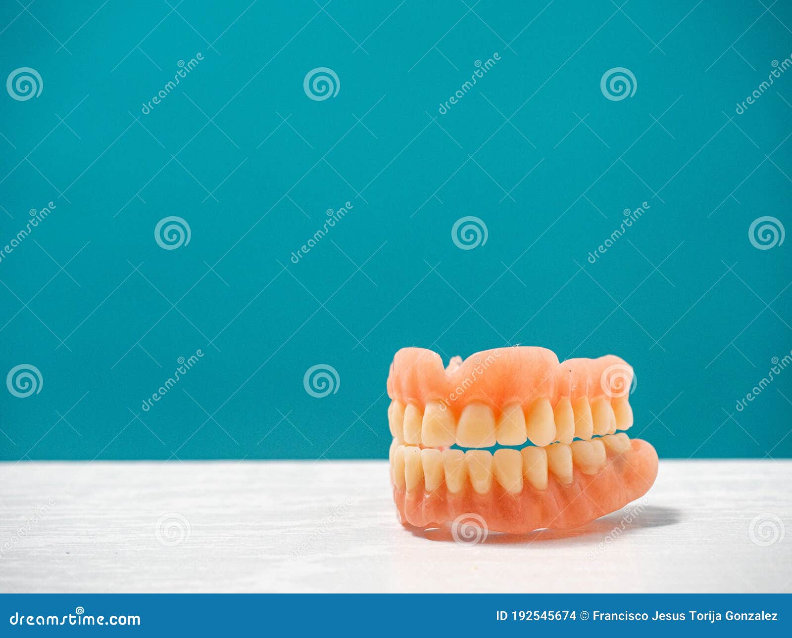 Dentures On A Blue Background. Close-up Of Dentures. Full Removable ...
